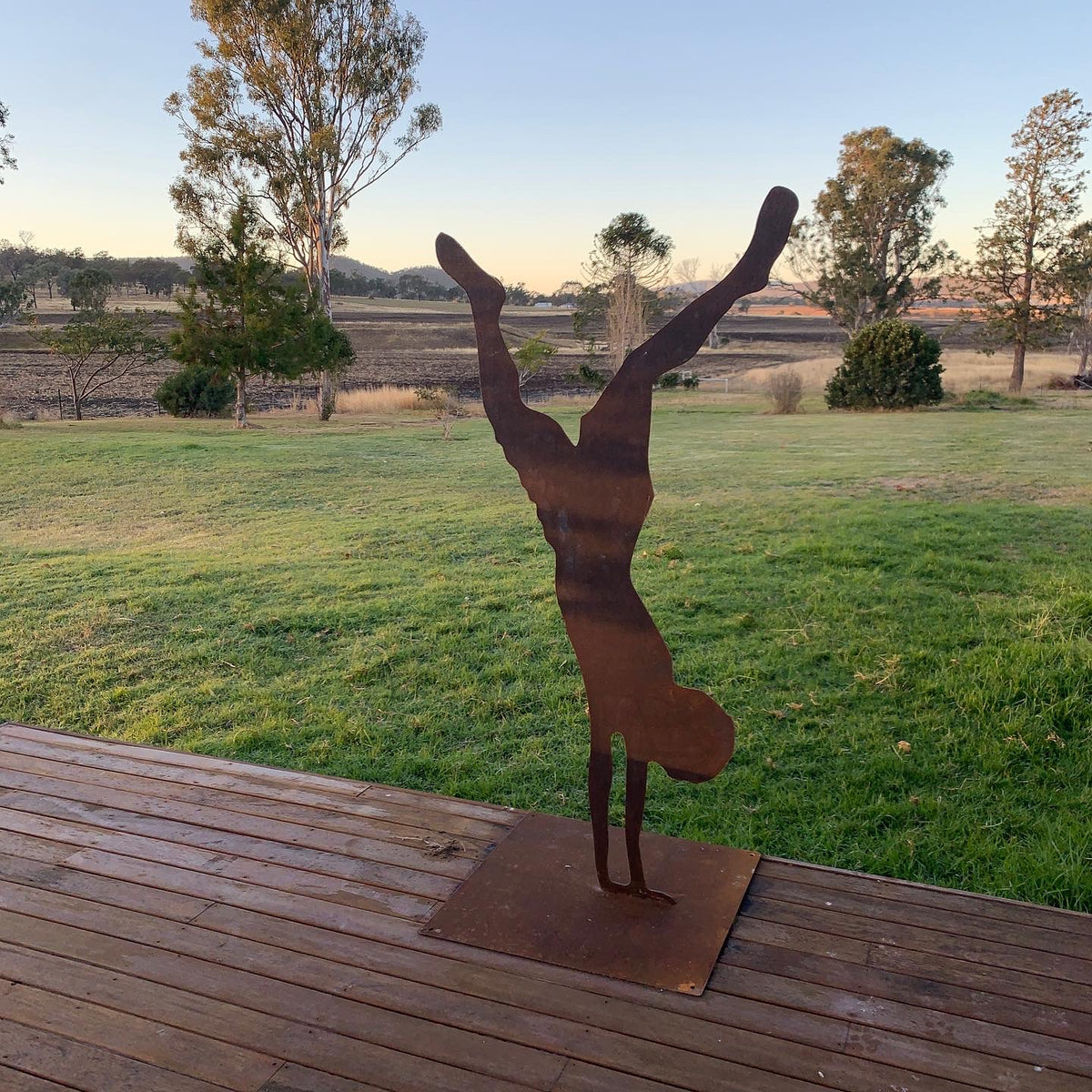 Handstand – The Rusty Pot